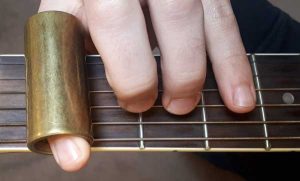 How to Use a Guitar Slide: Lesson with TAB - Guitar Gear Finder